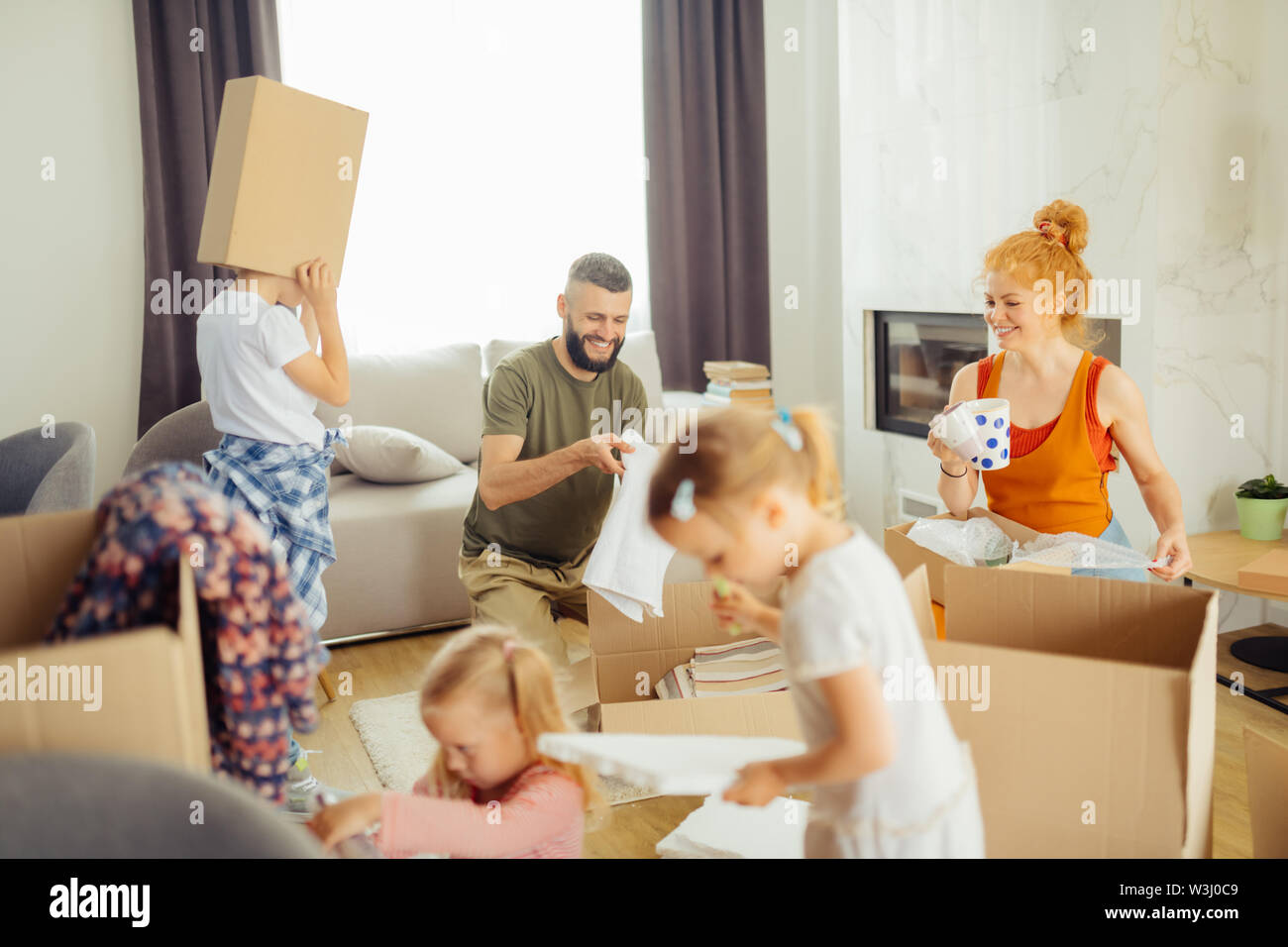Big happy family drawing together hi-res stock photography and images ...