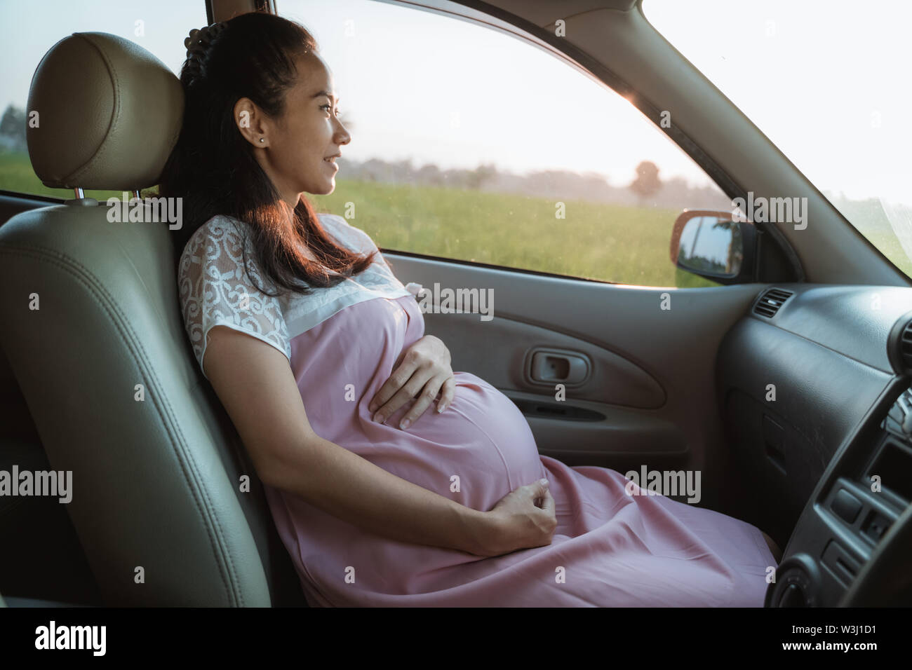 Family pregnant car hi-res stock photography and images - Alamy