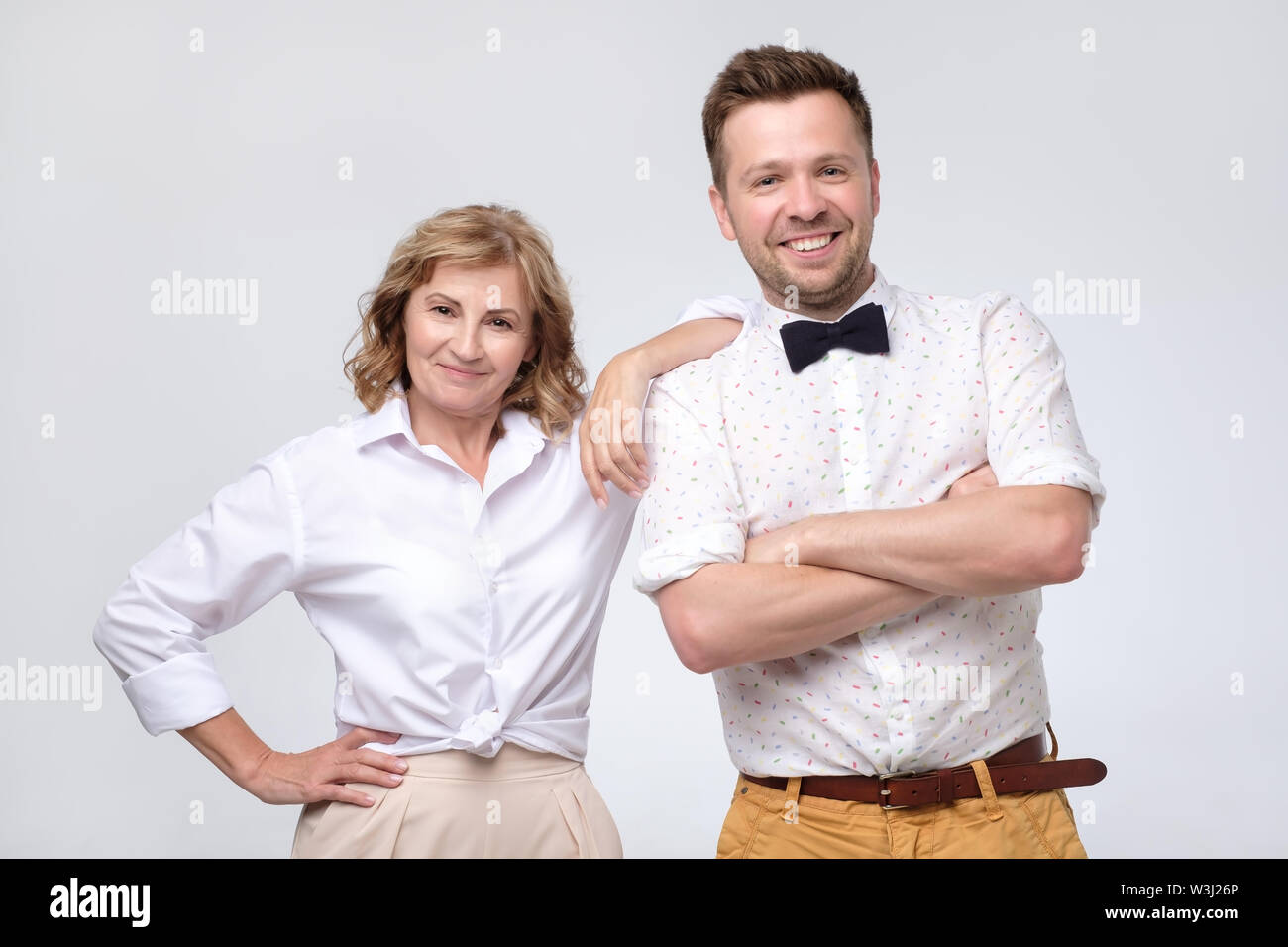 Woman standing man hi-res stock photography and images - Alamy