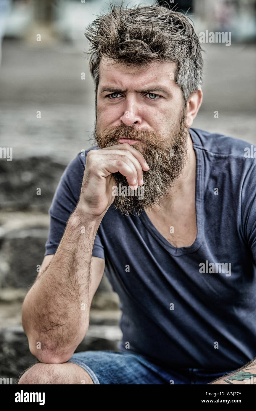 Making important choices. Man with beard and mustache thoughtful ...