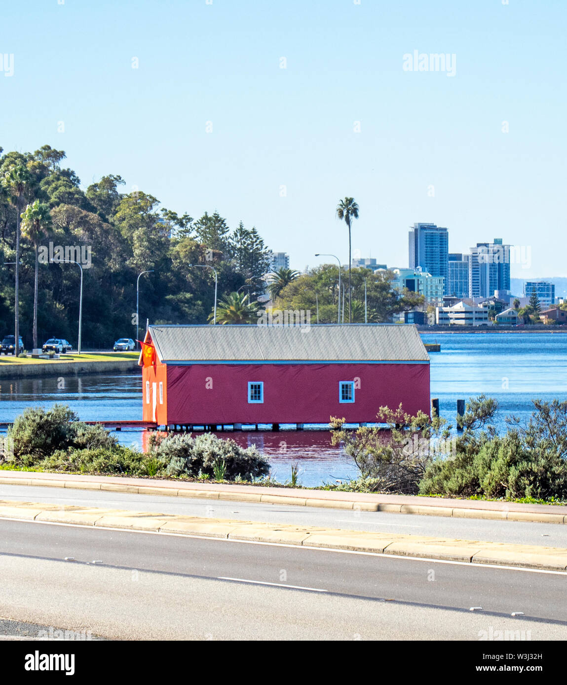 The iconic Crawley Edge Boatshed on the Swan River wrapped in red to ...