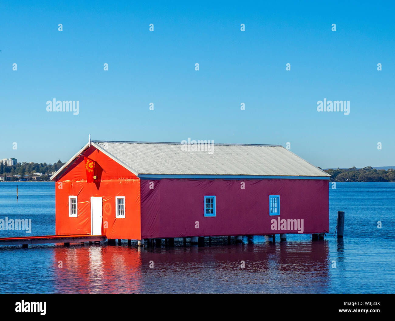 The iconic Crawley Edge Boatshed on the Swan River wrapped in red to ...