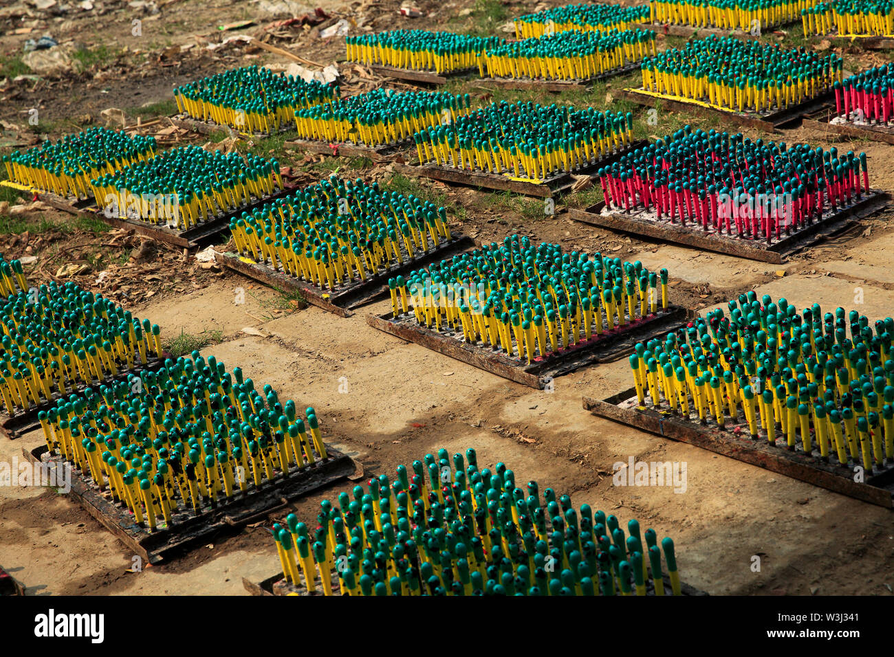 Drying racks of rubber balloon under the sun on the bank of Buriganga ...