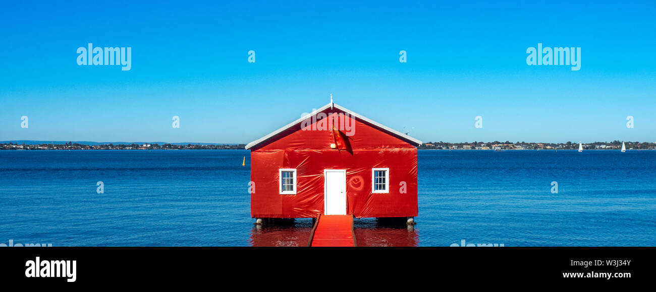 The iconic Crawley Edge Boatshed on the Swan River wrapped in red to ...