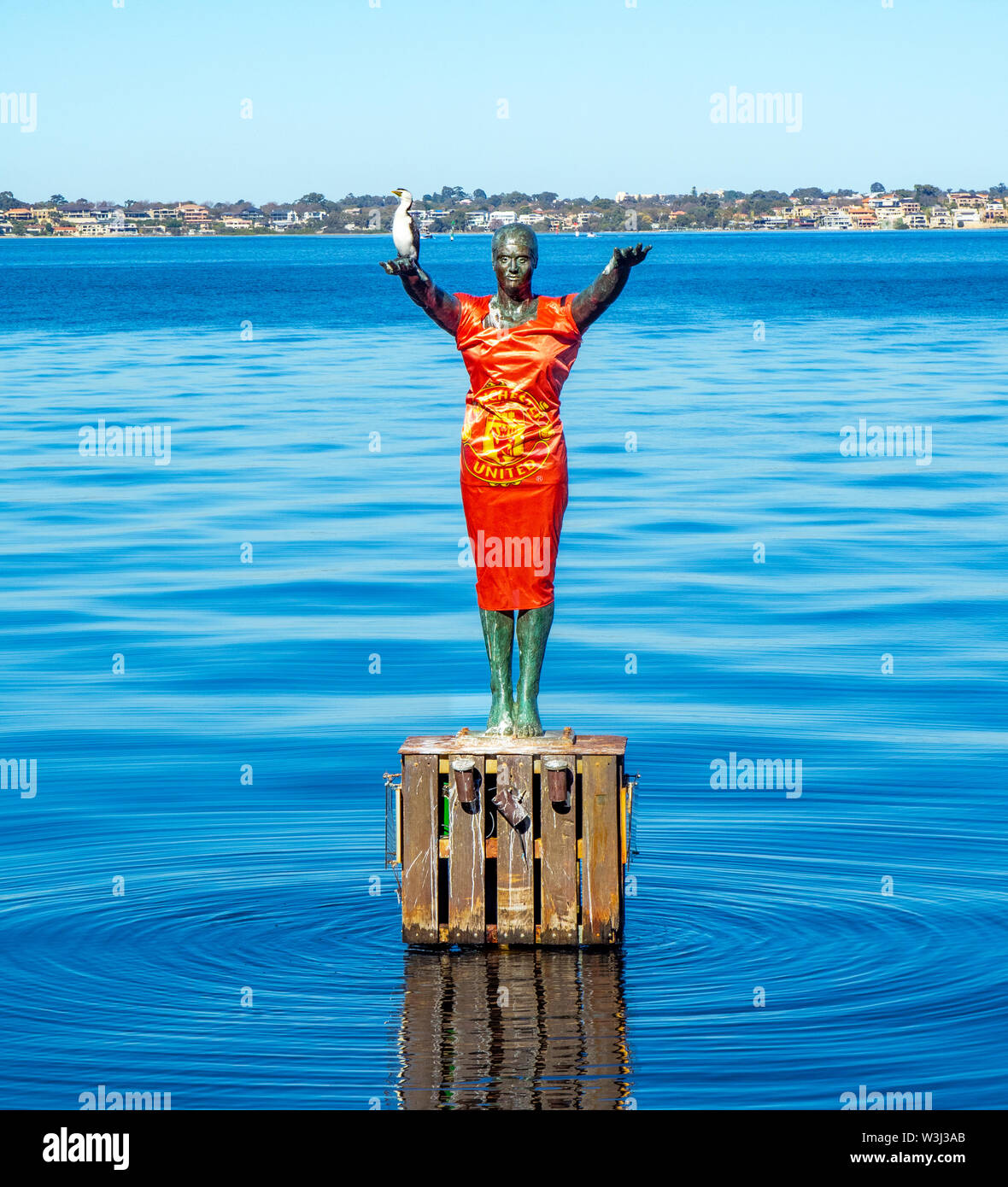 The iconic bronze Eliza statue on the Swan River wrapped in red to ...