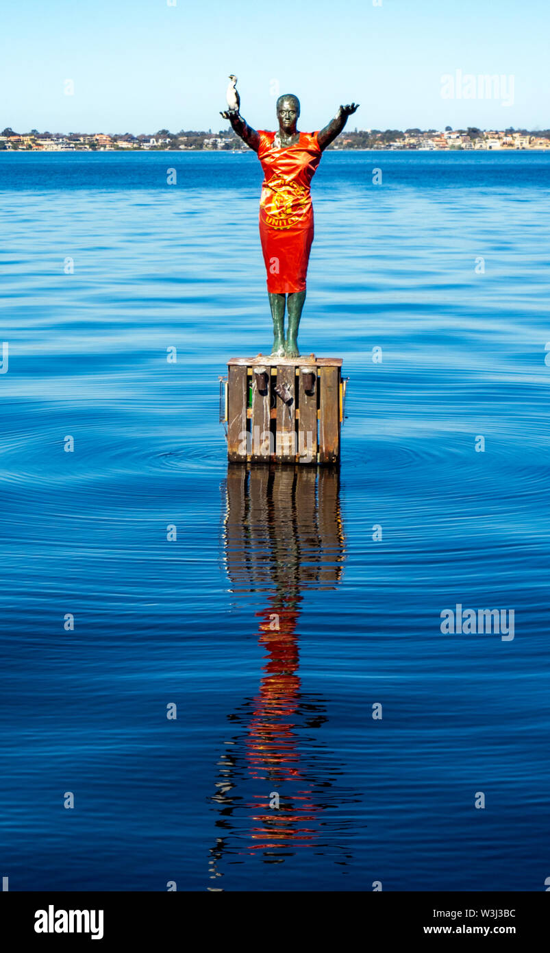 The iconic bronze Eliza statue on the Swan River wrapped in red to ...