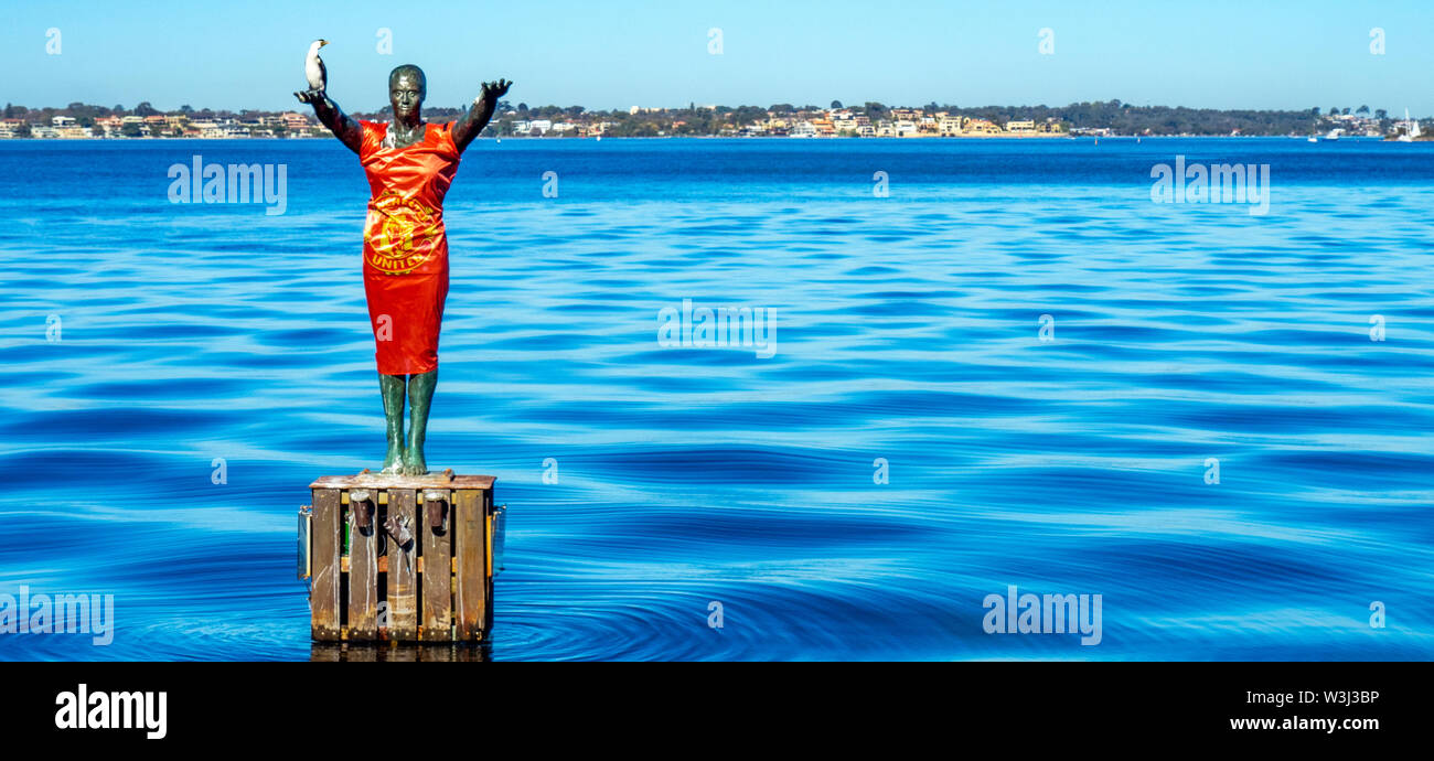 The iconic bronze Eliza statue on the Swan River wrapped in red to ...