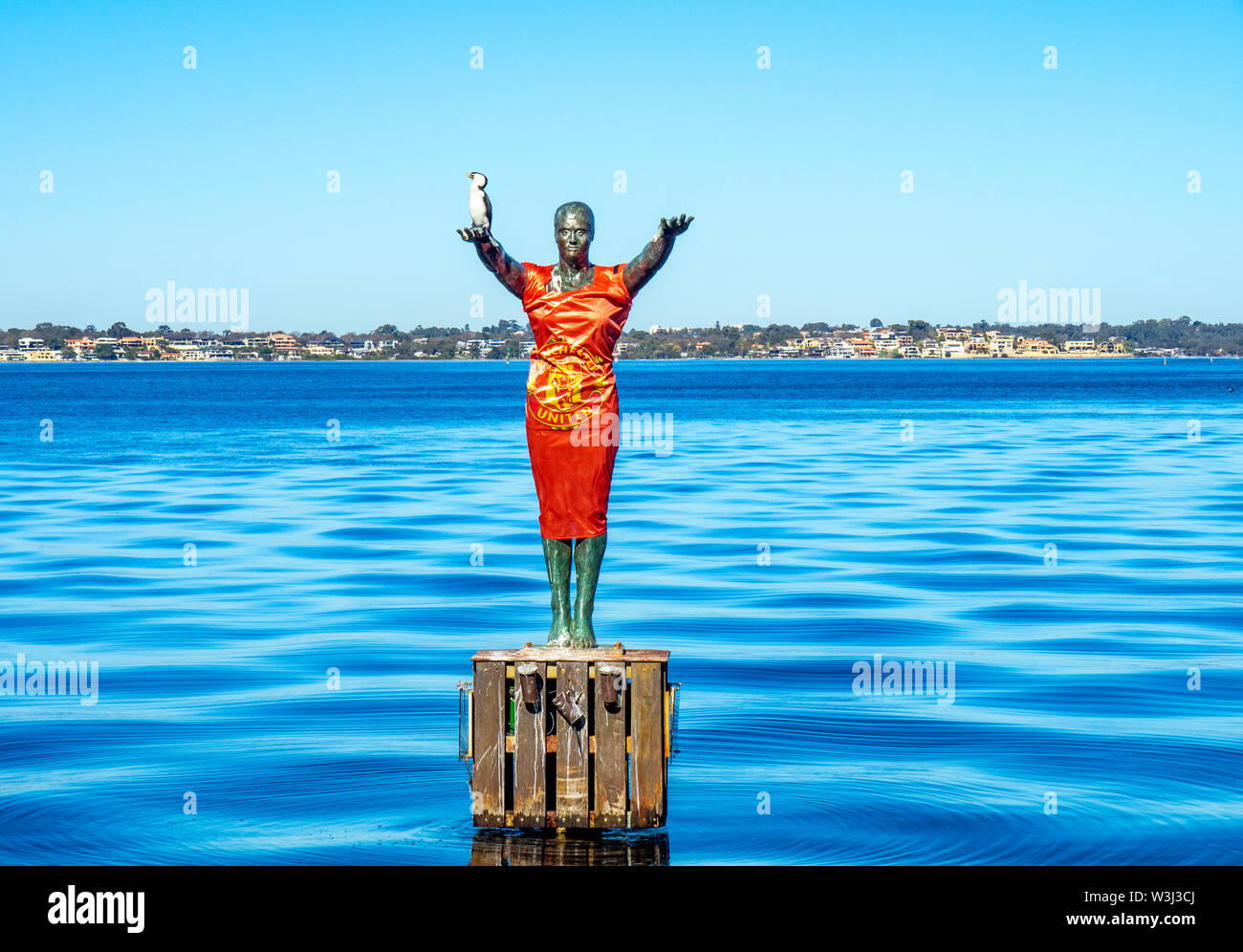 The iconic bronze Eliza statue on the Swan River wrapped in red to ...