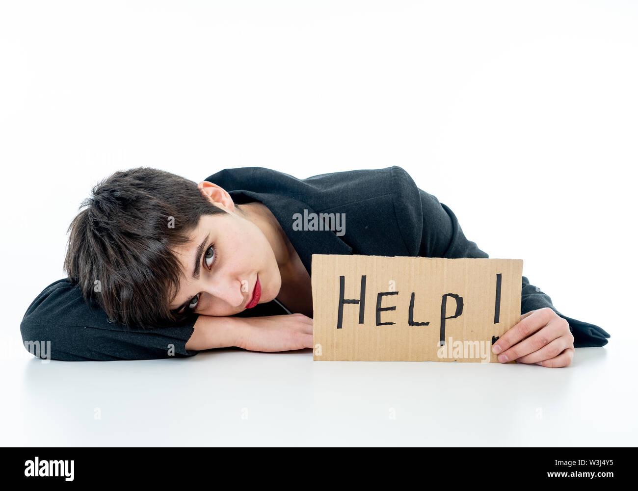 Beautiful business woman feeling overwhelmed and desperate asking for ...