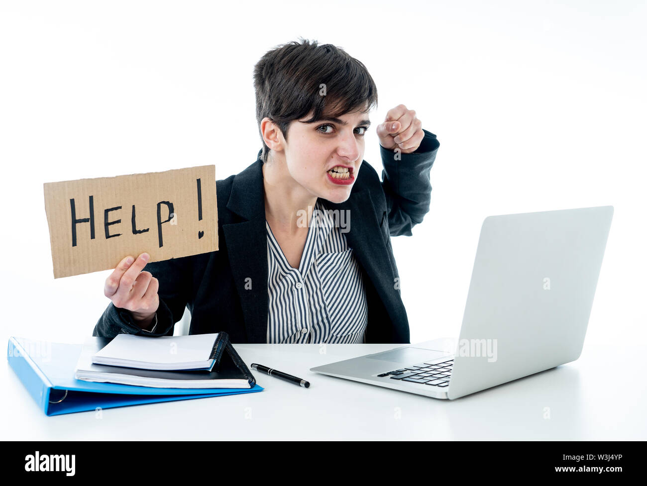 Tired and frustrated young attractive business woman working on ...