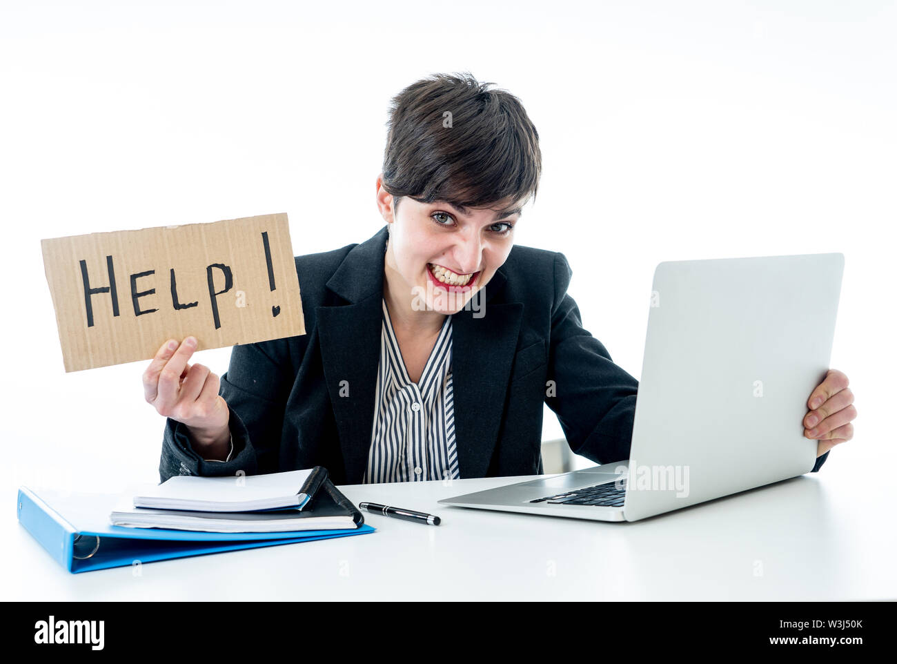 Tired and frustrated young attractive business woman working on ...