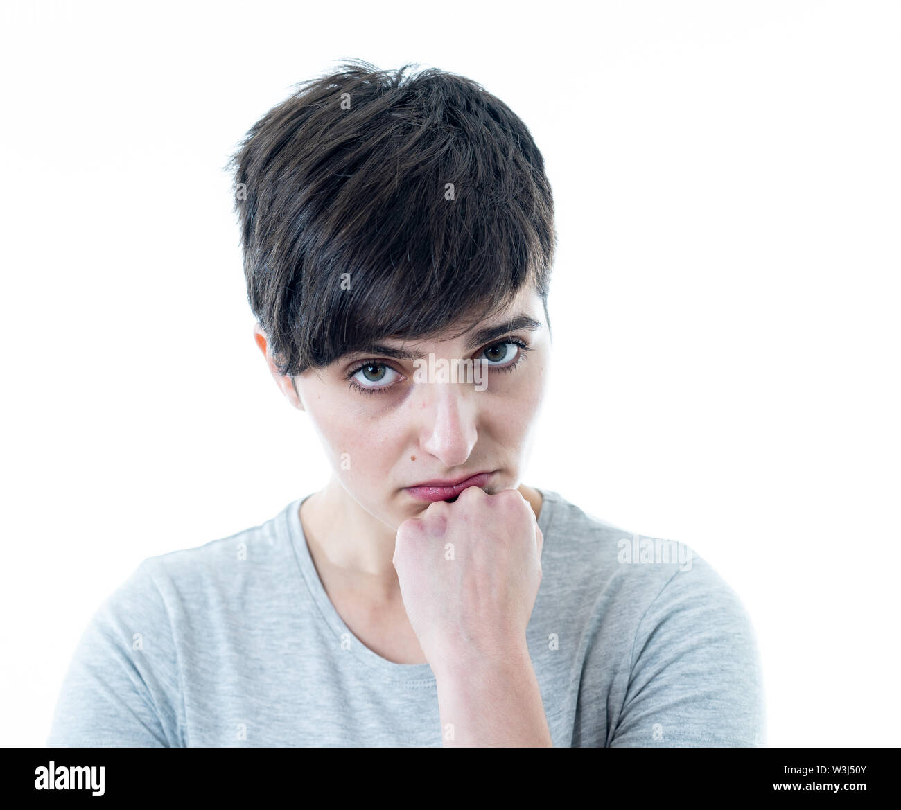 Close up portrait of beautiful young caucasian woman looking sad and ...