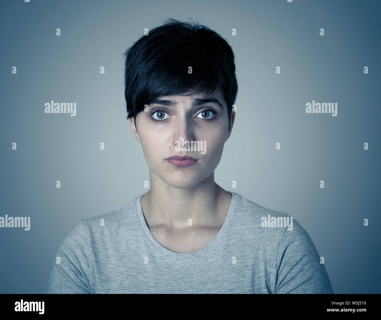 Portrait of beautiful sad young woman with unhappy face looking ...