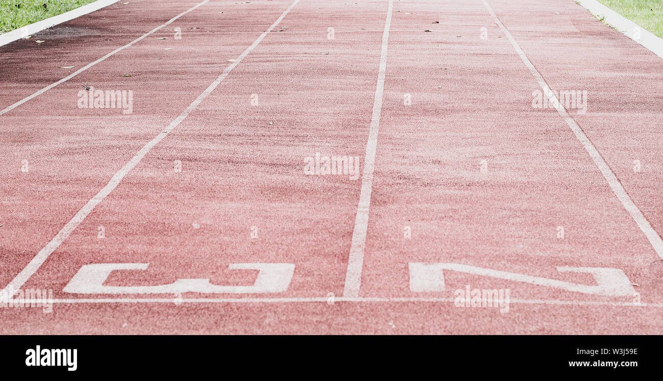 Starting line on running track .Red running track Synthetic rubber on ...