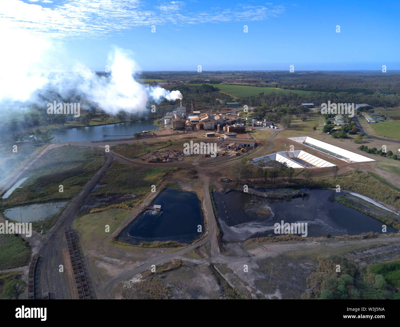 Aerial of factory processing the local sugar cane crop at the Isis ...