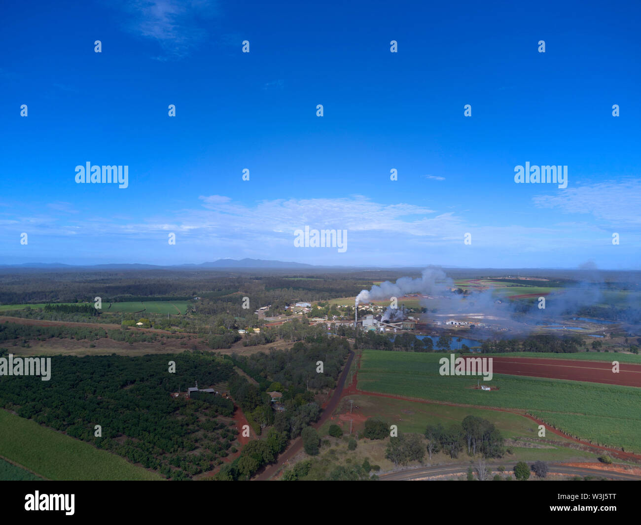 Aerial of factory processing the local sugar cane crop at the Isis ...
