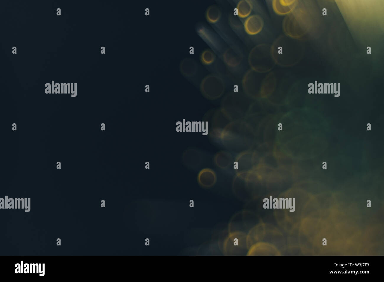 Beautiful colored bokeh on a dark abstract background Stock Photo - Alamy