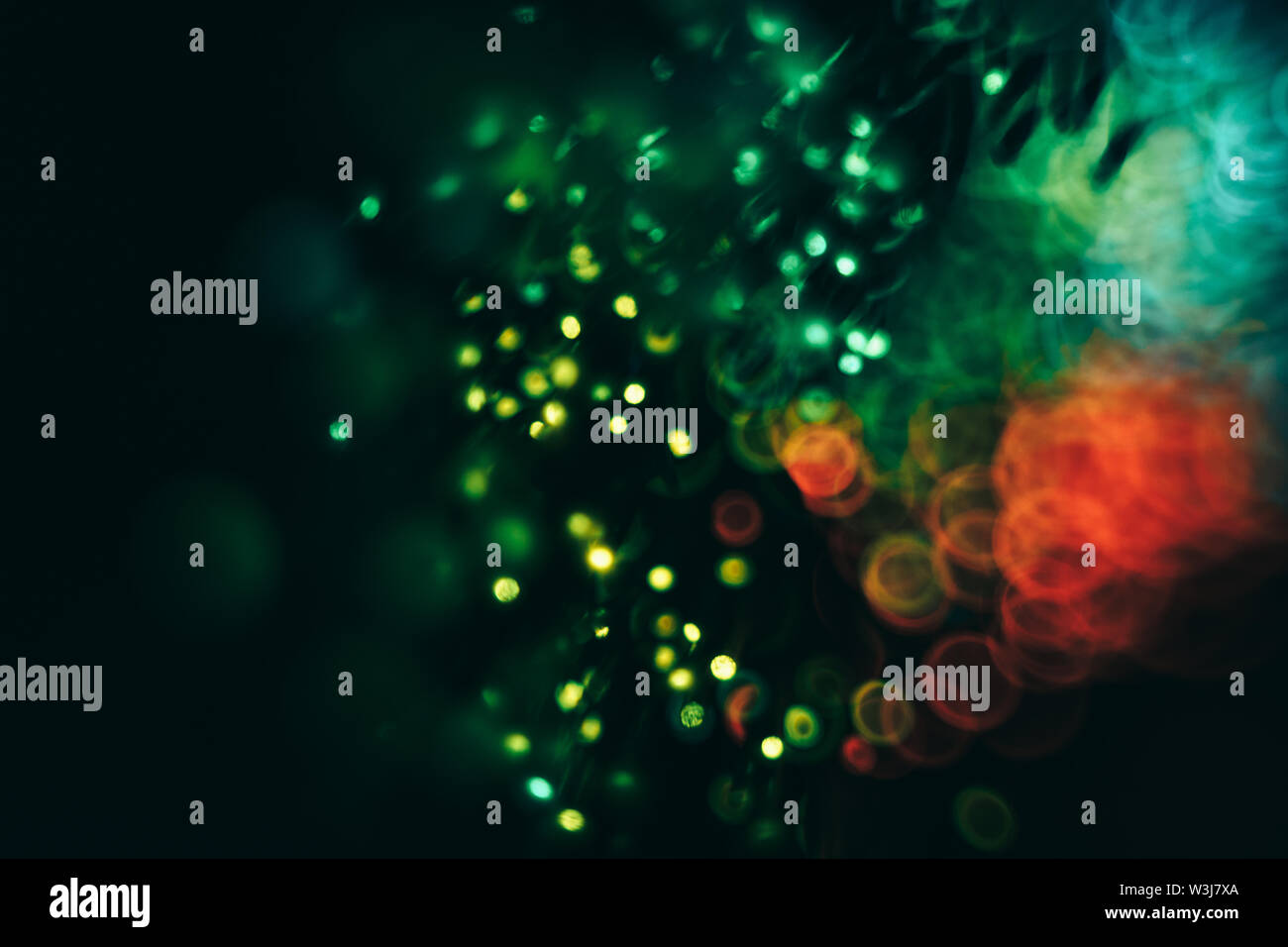 Beautiful colored bokeh on a dark abstract background Stock Photo - Alamy