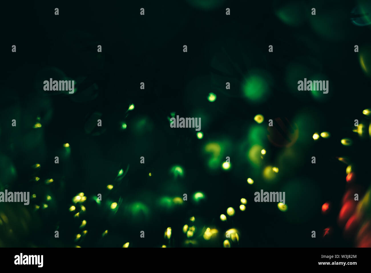 Beautiful colored bokeh on a dark abstract background Stock Photo - Alamy