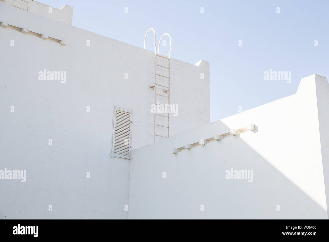 Modern white stone house in the Arab style. The concept of light and ...