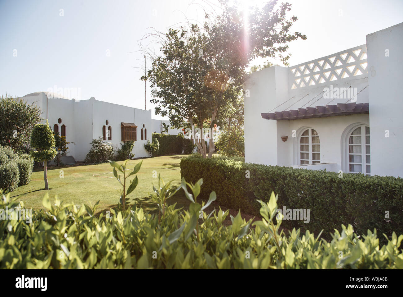 Modern white stone house in the Arab style. The concept of light and ...
