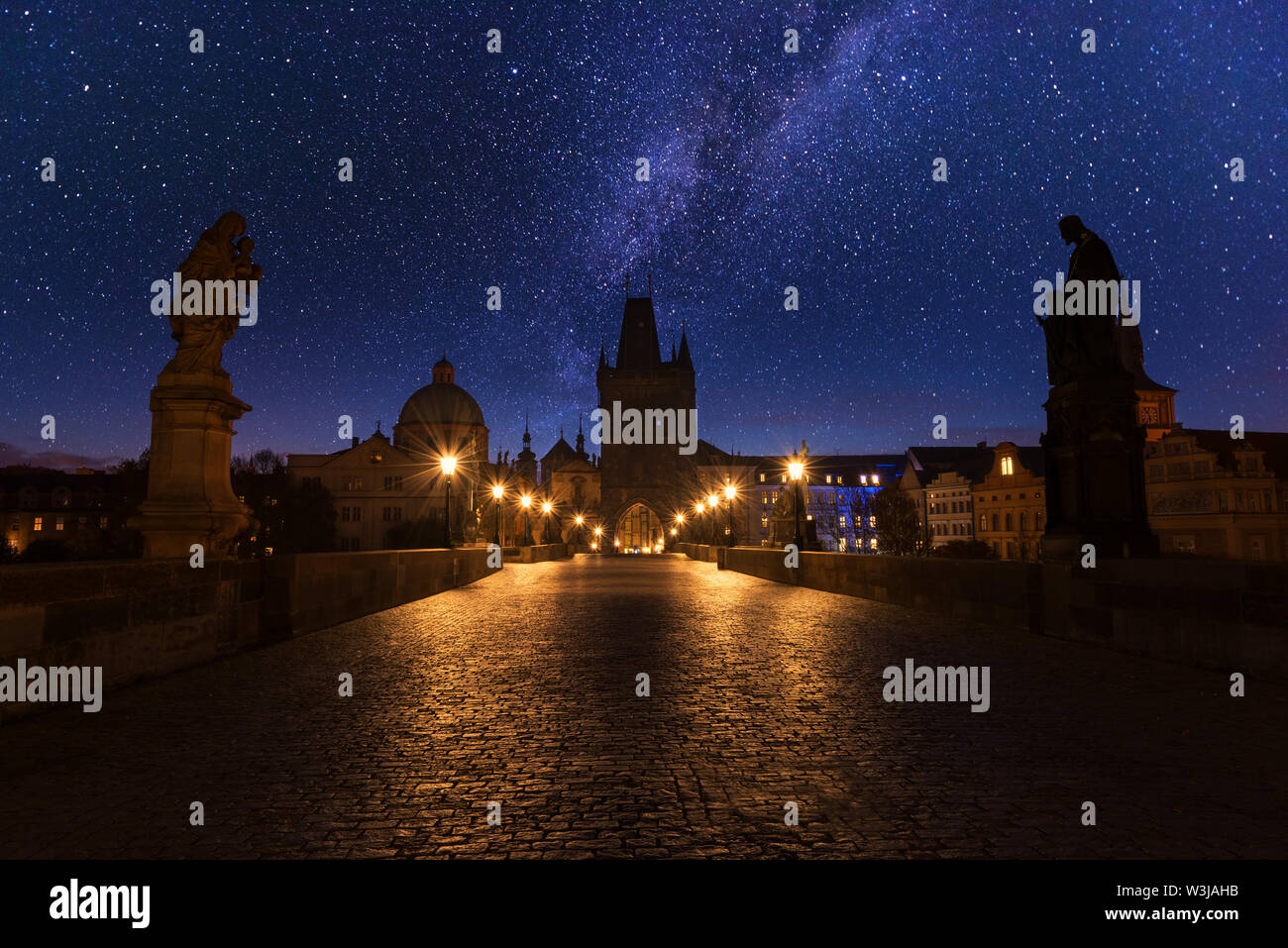 Prague, Charles bridge at night with starry sky Stock Photo - Alamy