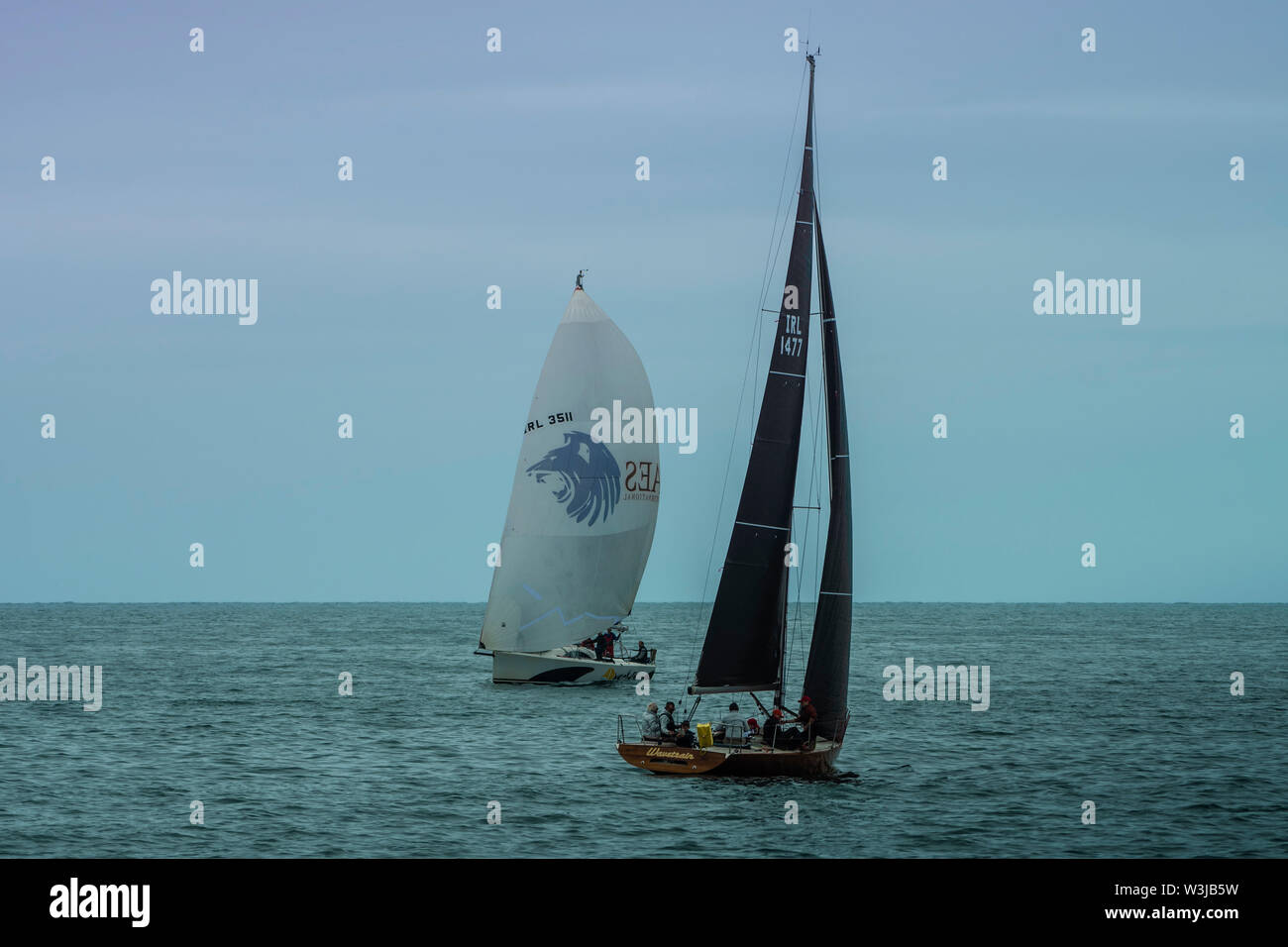 Meeting in the sea. Two sailing boats racing against each other Stock ...