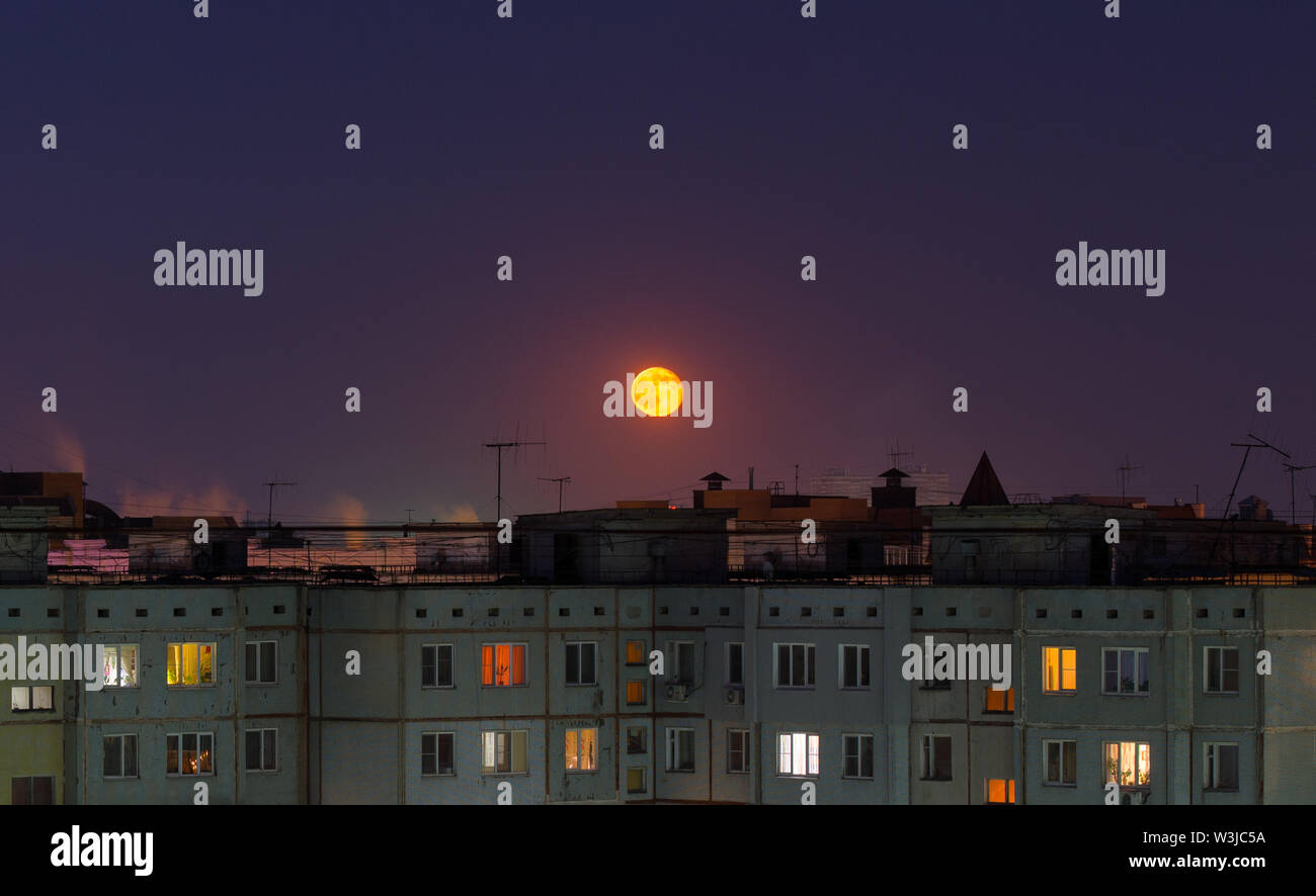 Windows, roofs and facade of an mass apartment buildings in Russia at ...