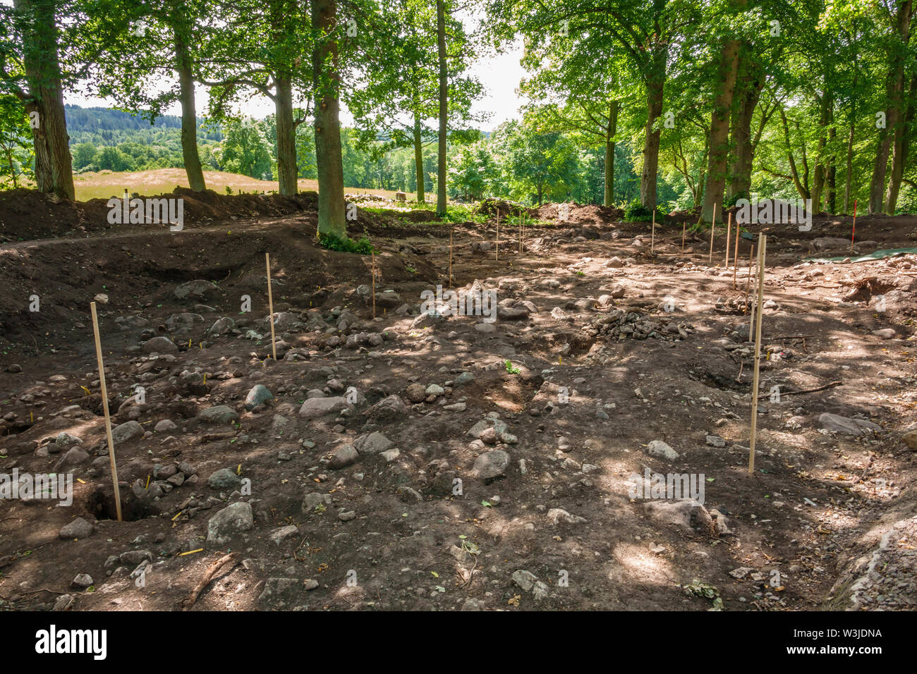 Archaeological excavation in the field Stock Photo - Alamy