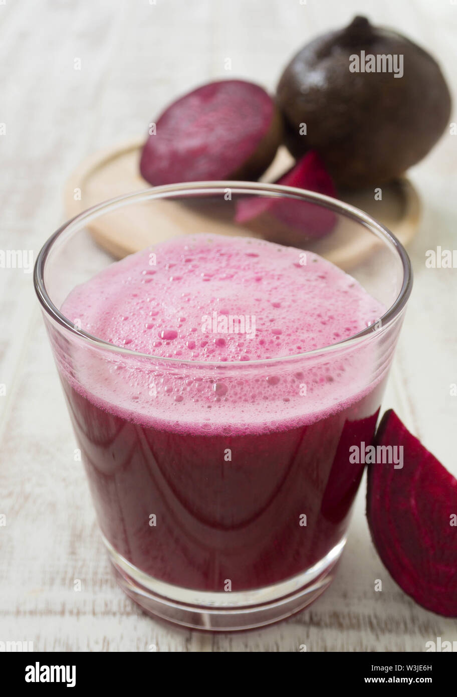 beetroot juice in glass on wood table. for health Stock Photo - Alamy