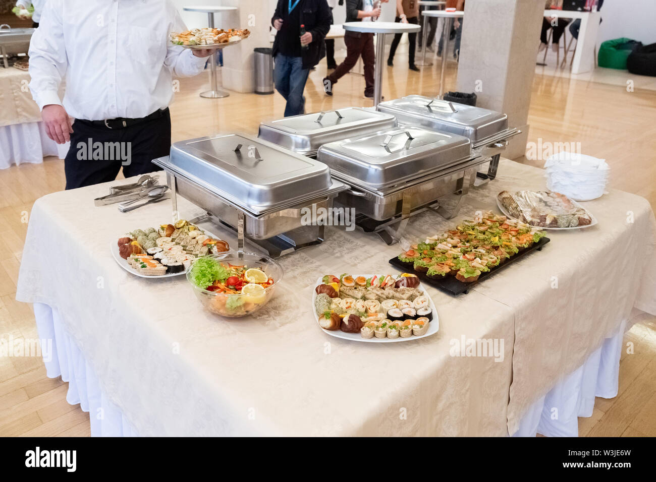 Catering buffet with food on table Stock Photo - Alamy