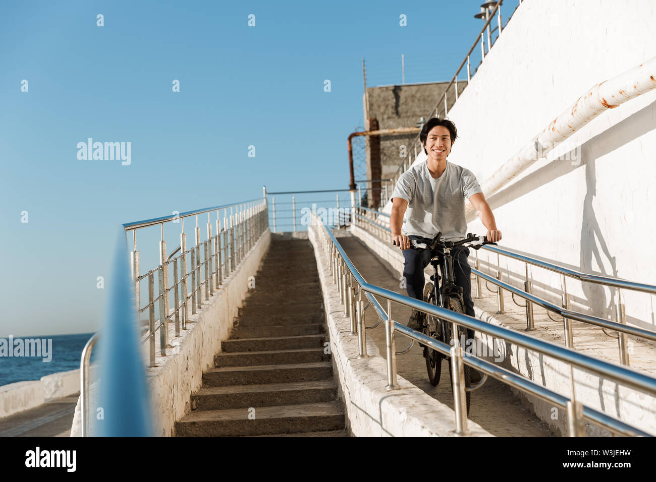 Bicycle down the steps hi-res stock photography and images - Alamy