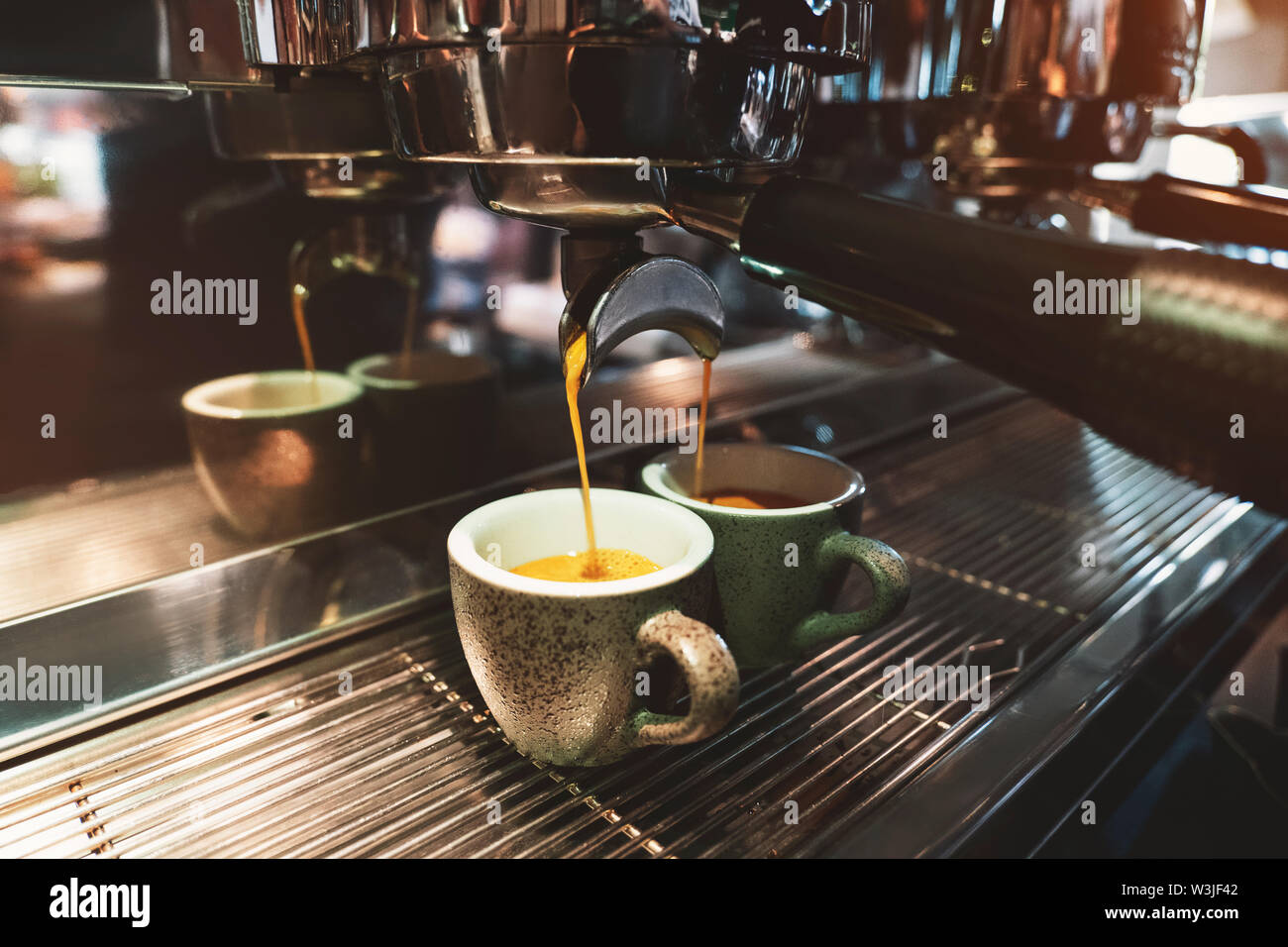 process of coffee drink making using professional coffee machine Stock ...