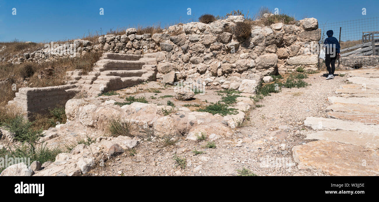 panorama of a tourist in the entrance courtyard of tel lachish ruins in ...