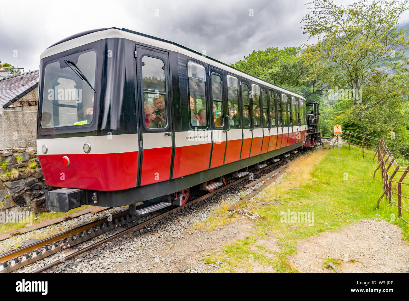 Mount Snowdon Railway, Llanberis, North Wales. A diesel train carrying ...