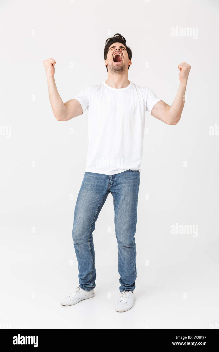 Image of a shocked surprised excited happy young man posing isolated ...