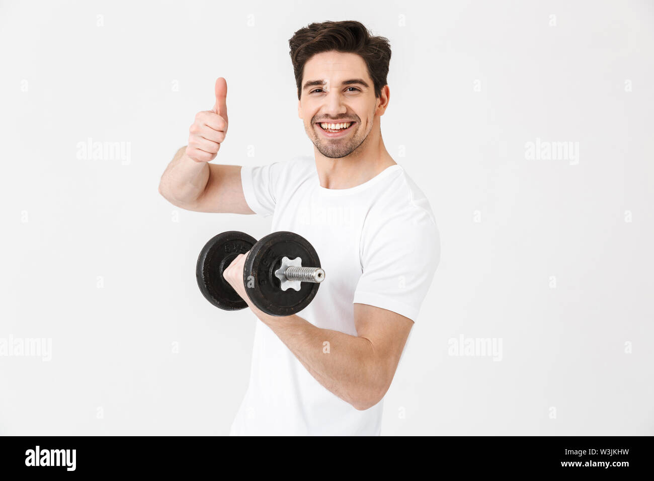 Image of emotional happy excited young man posing isolated over white ...