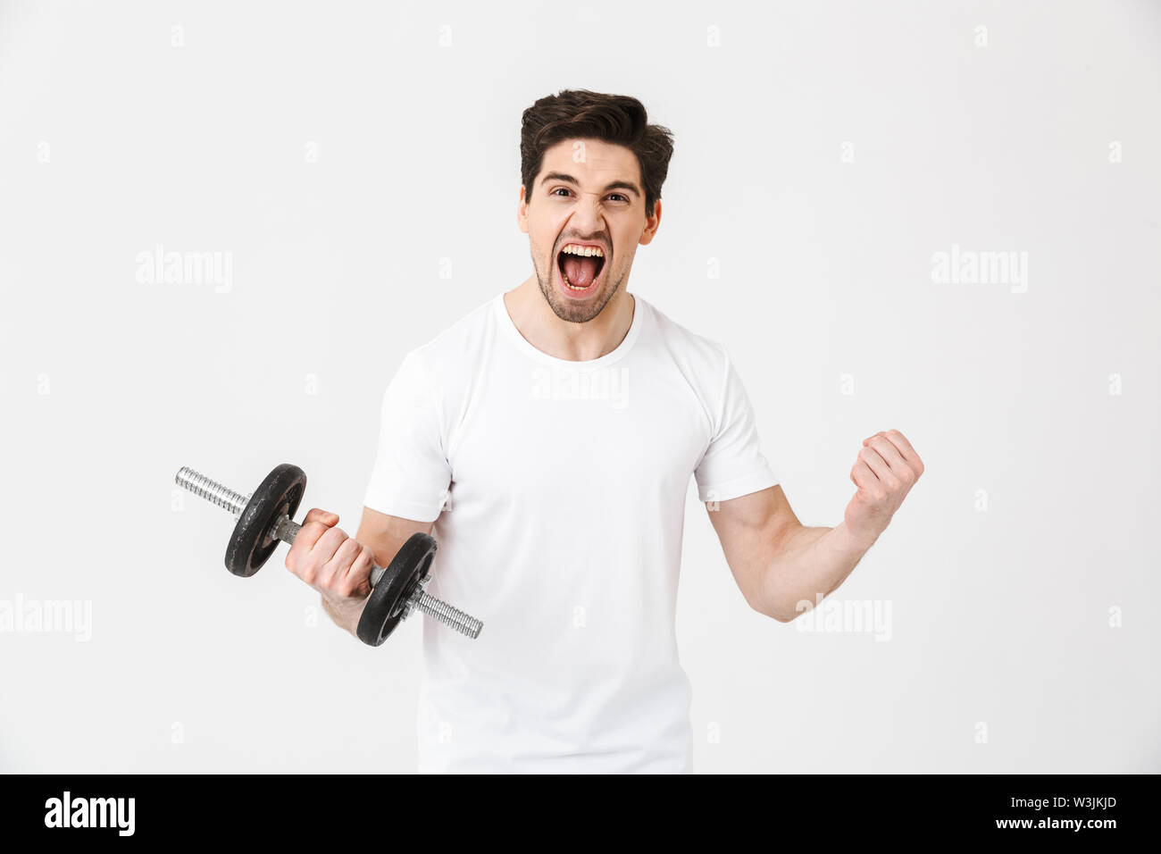 Image of emotional screaming excited young man posing isolated over ...