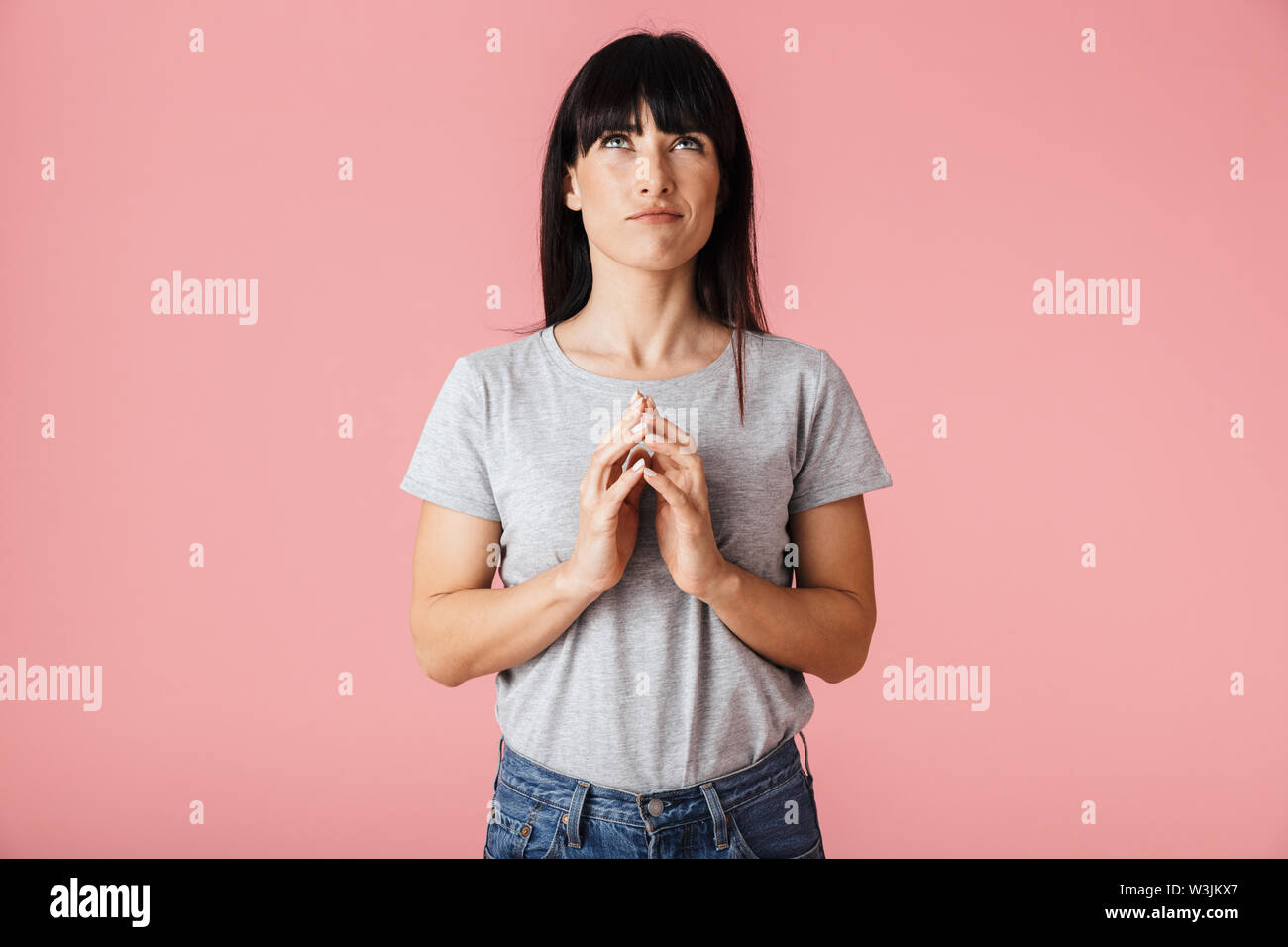Image of a beautiful amazing emotional nervous woman posing isolated ...