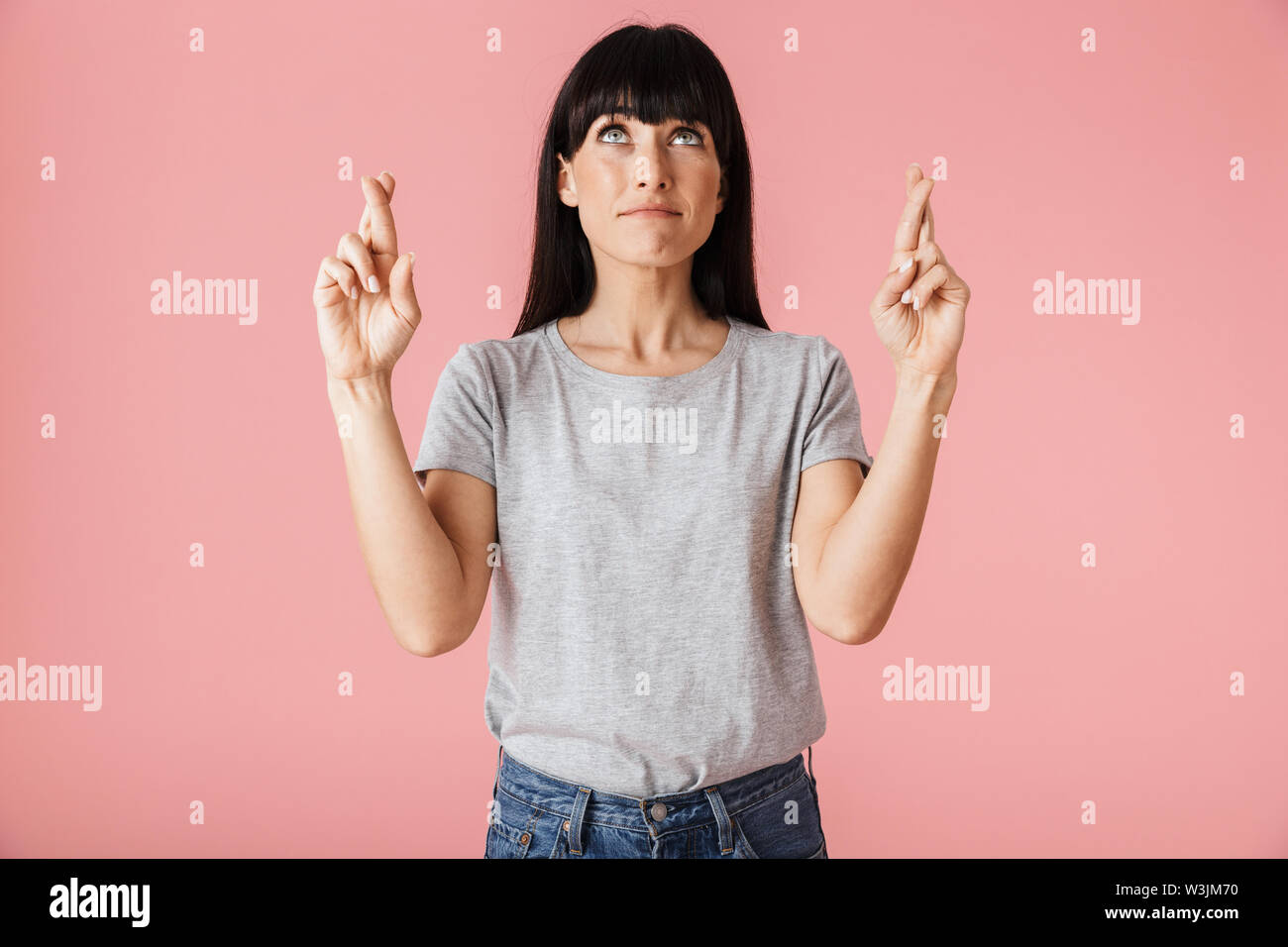 Image of a beautiful amazing emotional nervous woman posing isolated ...