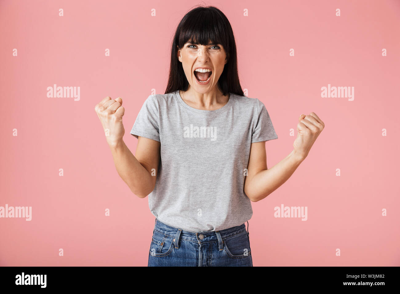 Image of a beautiful amazing screaming excited woman posing isolated ...