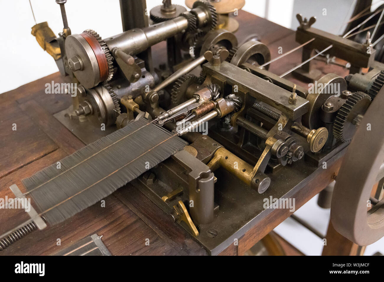 Old reed binding machine for weaving Stock Photo - Alamy
