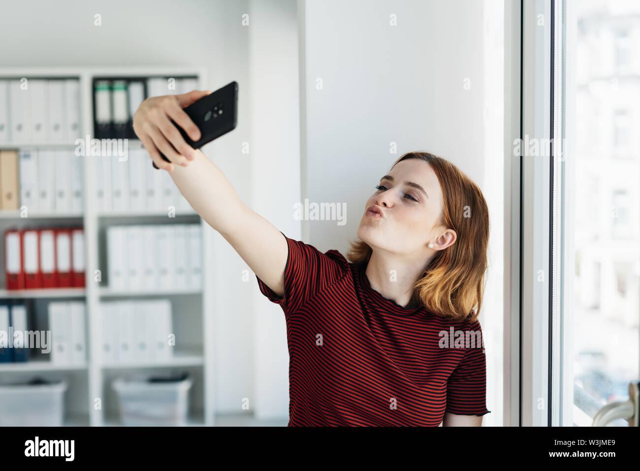 Woman puckering for a kiss hi-res stock photography and images - Alamy