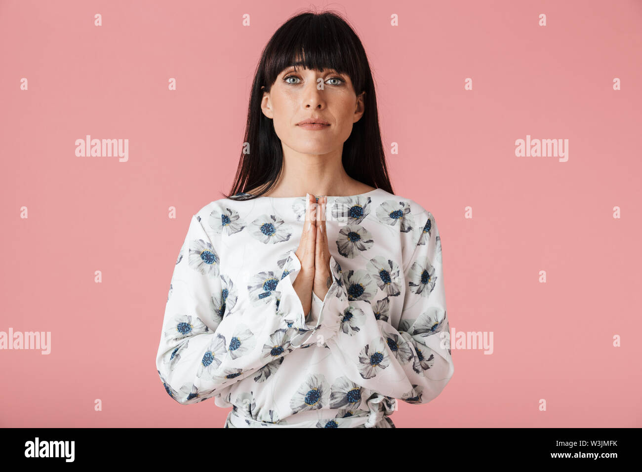 Image of a beautiful amazing emotional nervous woman posing isolated ...