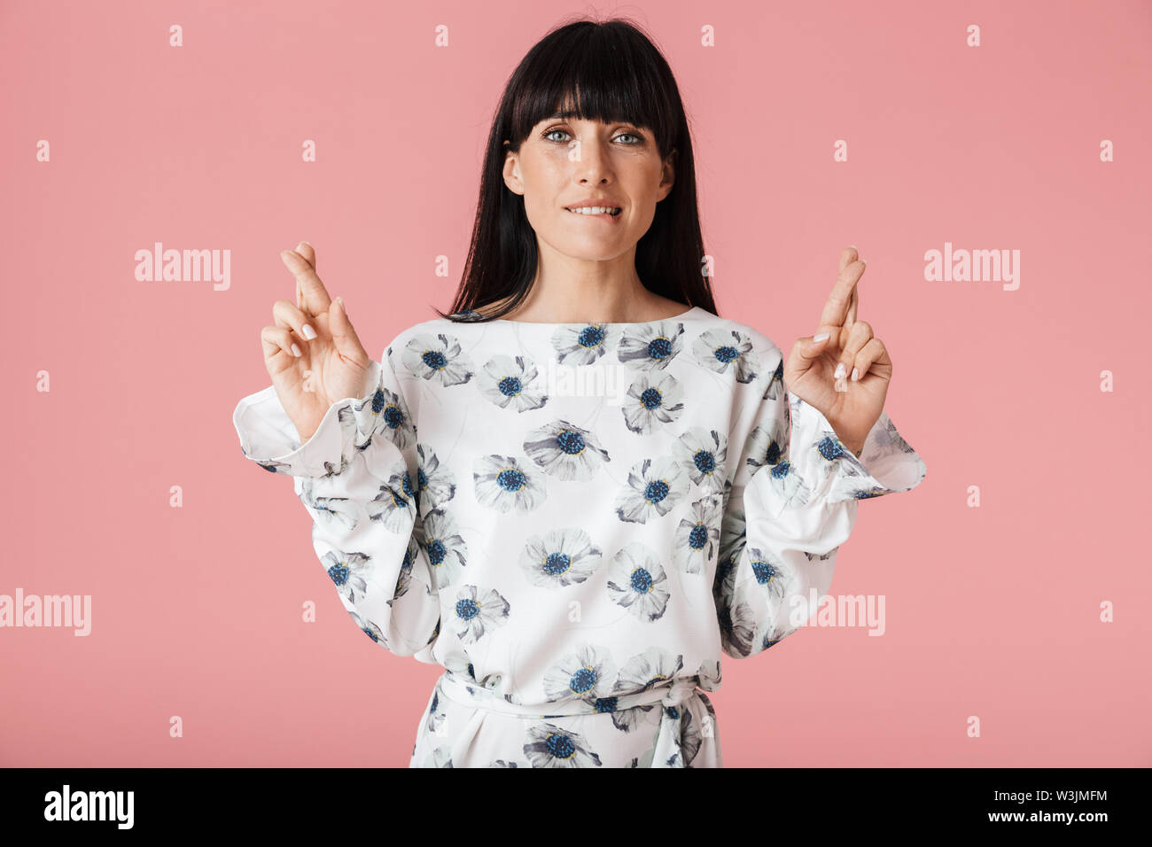 Image of a beautiful amazing emotional nervous woman posing isolated ...