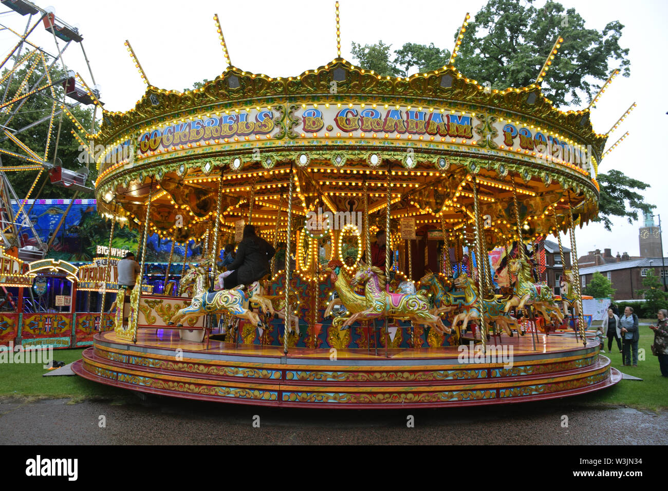 Childrens funfair roundabout hi-res stock photography and images - Alamy