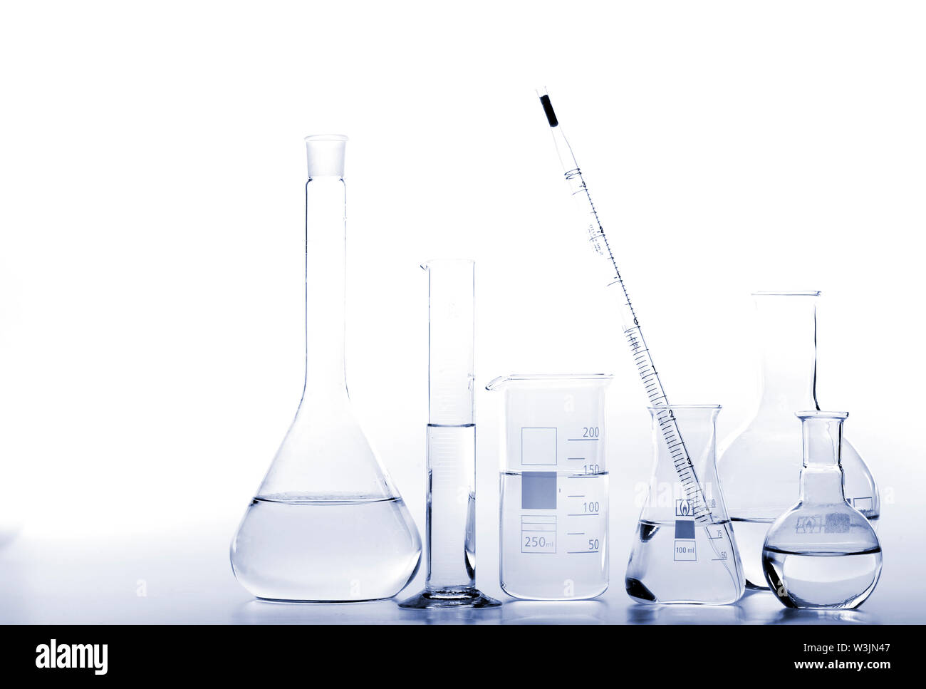 Test-tubes with reflections on a white and blue background. Laboratory ...