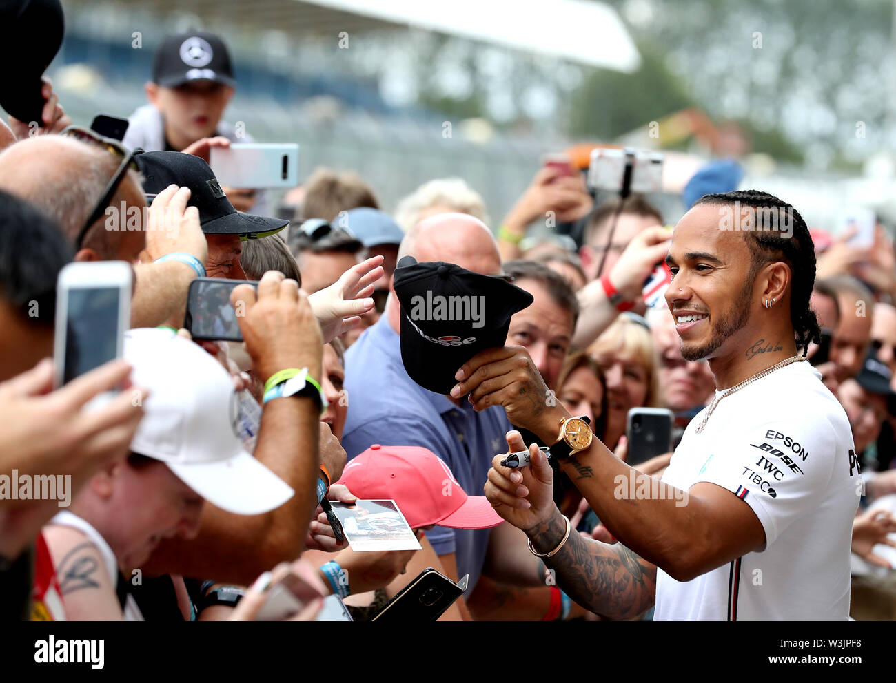 Mercedes Driver Lewis Hamilton interacts with fans during a preview day ...