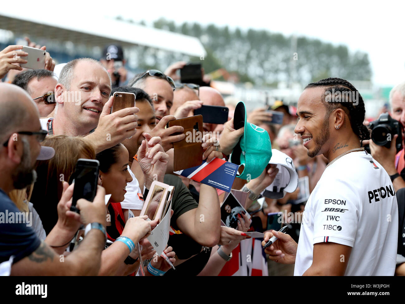 Mercedes Driver Lewis Hamilton interacts with fans during a preview day ...