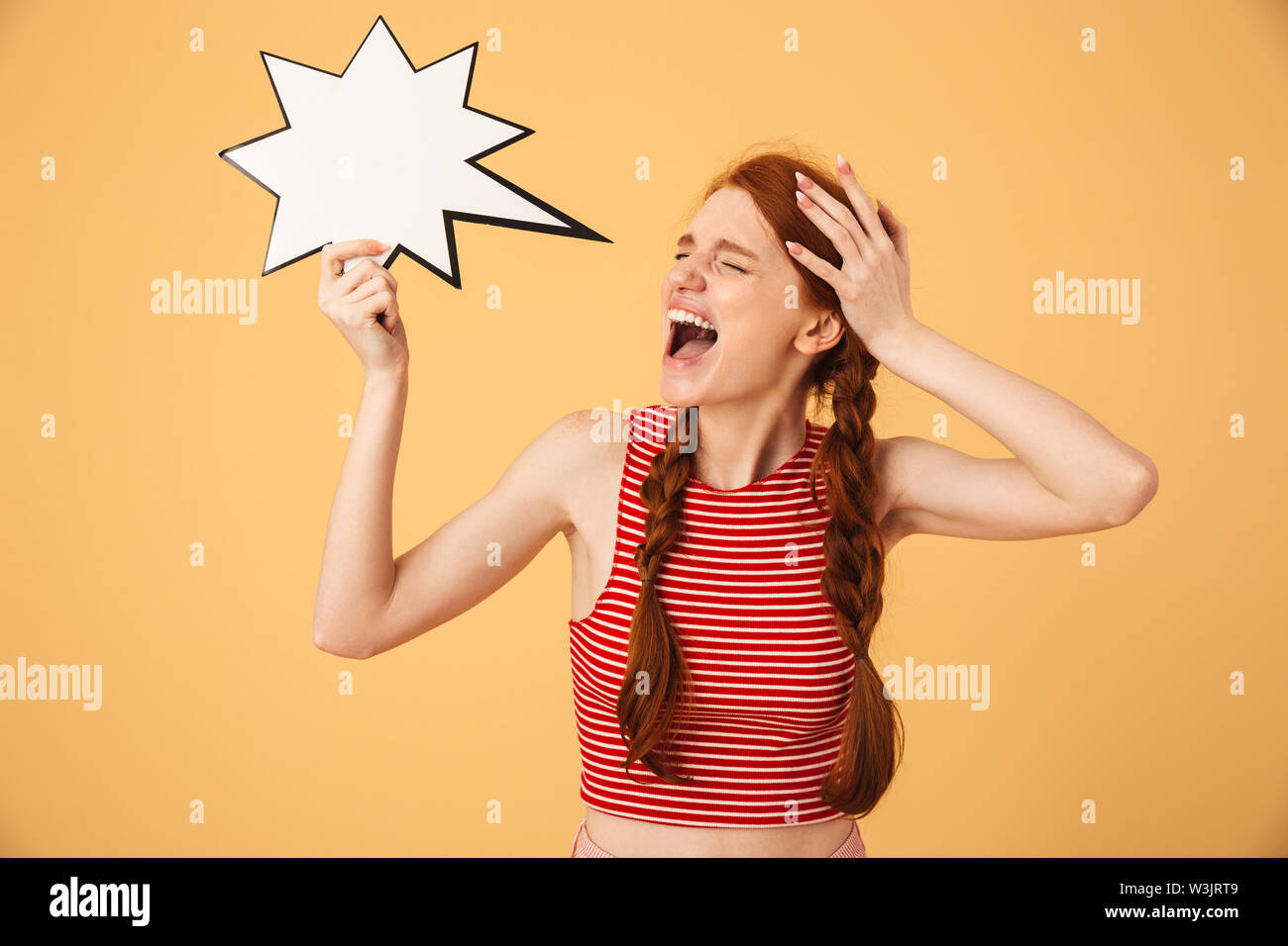 Image of a sad screaming young beautiful redhead woman posing isolated ...